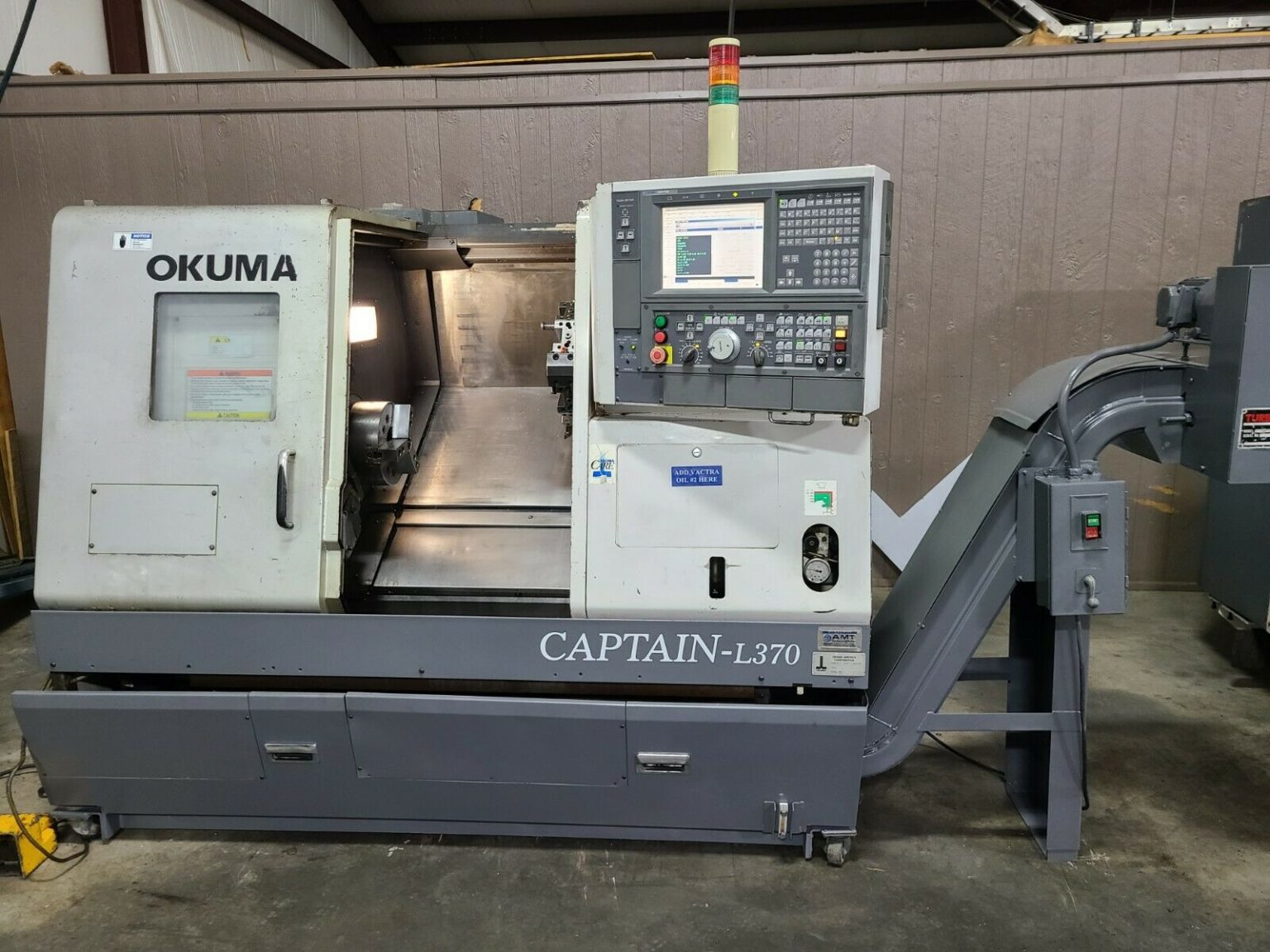 Okuma Captain L370-BB CNC Lathe w/ Chip Conveyor - The Equipment Hub