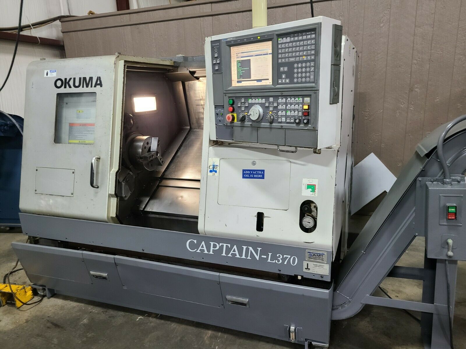Okuma Captain L370-BB CNC Lathe w/ Chip Conveyor - The Equipment Hub