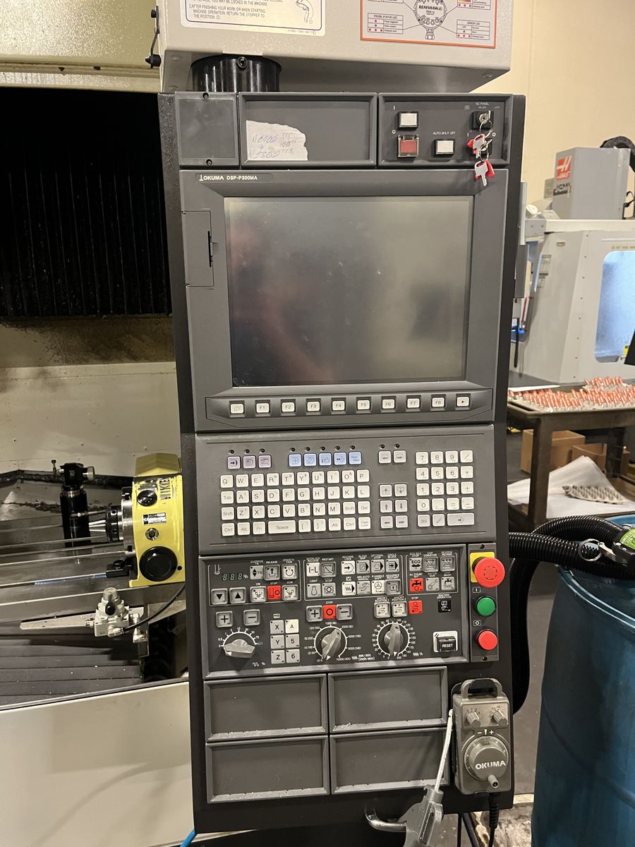 Okuma Genos M560-V CNC Vertical Machining Center, Nikken 4th Axis - The ...