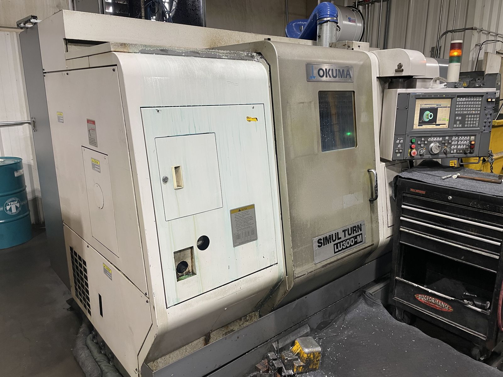 Okuma LU 300M CNC Lathe w/ Live Tooling - The Equipment Hub